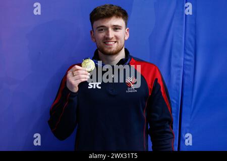 Matty Lee poses for a photo at the Aquatics centre at the Queen ...