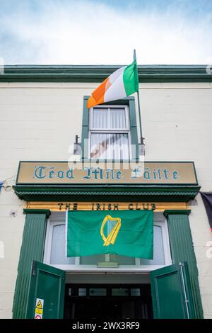 Flag of the United Irishmen hanging under the greeting Cead Mile Failte ...