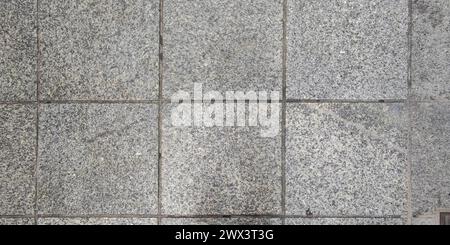 Sett pavement made with cut granite slabs. Monumental Complex road ...
