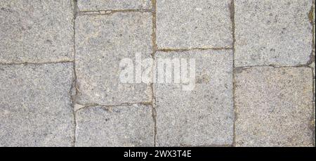 Sett pavement made with cut granite slabs. Monumental Complex road ...