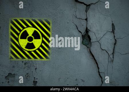 Radioactive sign on old cracked wall. Hazard symbol Stock Photo - Alamy