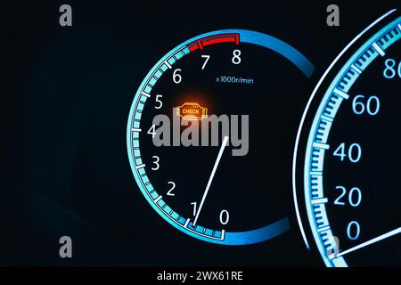 Check engine error light illuminated on car dashboard Stock Photo - Alamy