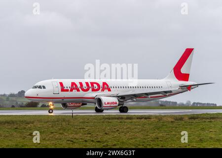 Lauda Air Airbus A320-214 taxiing on the runway at Cork Airport, Cork ...