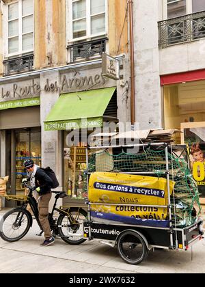 Bicycle with a trailer full of cardboard boxes to recycle, soft mean of ...