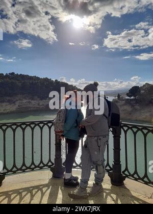 couple in love poses at the lake's lookout point Stock Photo - Alamy