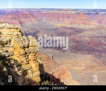 A canyon formation towers above the landscape surrounded by oceans of ...