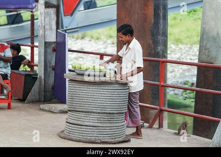 People eat food at a roadside stall in Kolkata, India, on June 2, 2026 ...