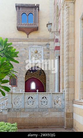 A Mamluk style stone facade featuring a richly decorated wooden door ...