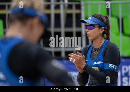 Saquarema, Brazil. 28th Mar, 2024. Wang Yanwei (R)/Li Jie of China ...