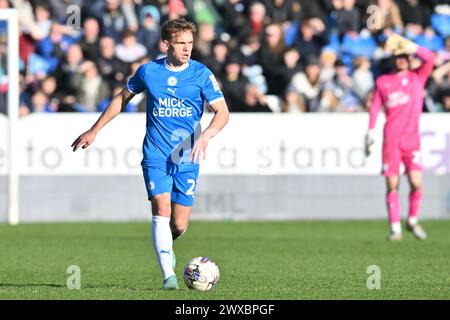 Archie Collins (4 Peterborough United) goes forward during the Sky Bet ...
