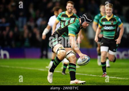 Northampton Saints' Alex Coles scores his side's second try of the game ...