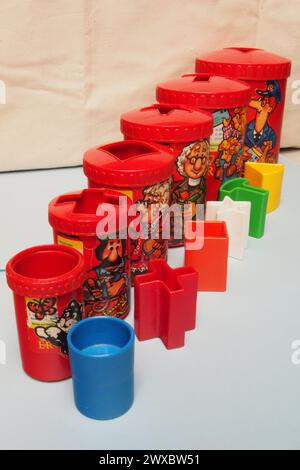 A retro, colourful, Postman Pat shape sorting toy, made with six ...