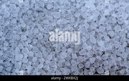 a lot of round crystals of ice precipitation fell in the form of hail ...