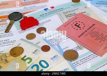 A french driver's license, a vehicle registration certificate and a car ...