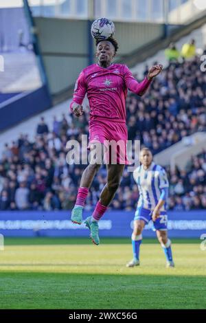 Jamal Lowe #10 of Swansea City warms up ahead of the match, during the ...
