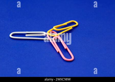 Notes with different directions joined with a clip Stock Photo - Alamy