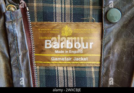 Label inside Barbour Gamefair well worn waxed cotton jacket. Outdoor ...