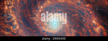 The winding arms of the grand-design spiral galaxy M51 stretch across ...