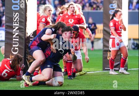 England's Hannah Botterman (right) celebrates after scoring her sides ...