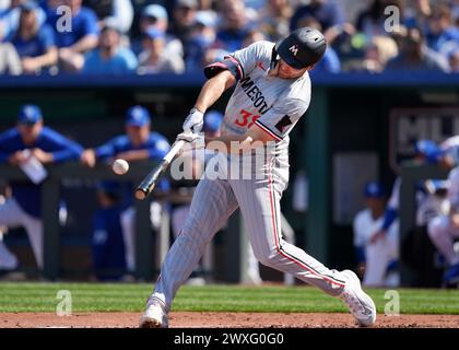 Minnesota Twins Matt Wallner (38) is greeted by Royce Lewis (23) after ...