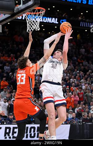 UConn center Donovan Clingan shoots during the second half of an NCAA ...