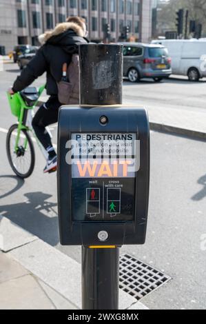 Pedestrian crossing electronic push button panel on a street in England ...