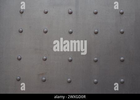 Wrought iron rivets in rough timber plank door Stock Photo - Alamy