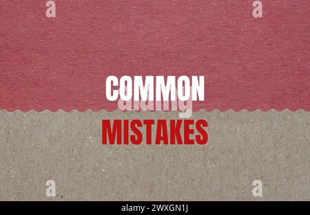 Common mistakes words written on wooden blocks with blue background ...