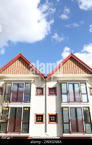 Modern housing with colourful windows gable ends, housing market, flats ...