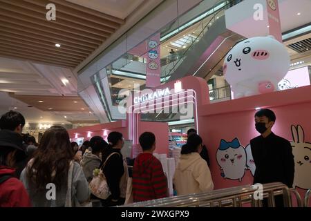 SHANGHAI, CHINA - MARCH 31, 2024 - Young people buy Chiikawa dolls of ...
