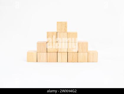 wood cube arrange in pyramid shape ,business concept Stock Photo - Alamy