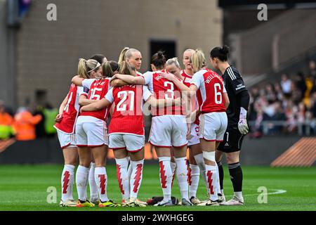 Arsenal players form a huddle ahead of the Premier League match at the ...