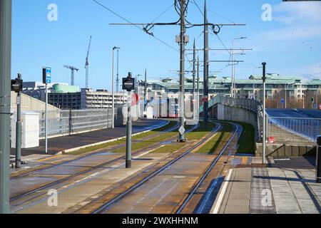 Tram approaching a platform in Newhaven, Edinburgh, Scotland Stock ...
