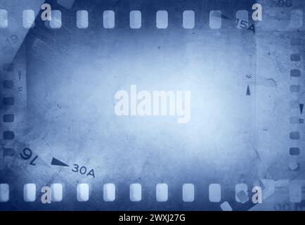Film negatives frames blue background Stock Photo - Alamy
