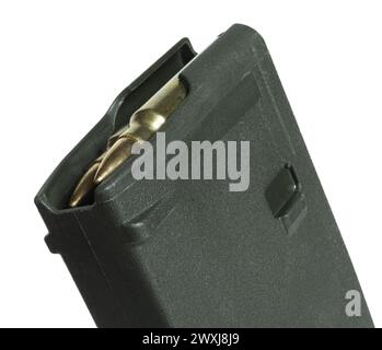 AR-15 polymer magazine loaded with 30 cartridges isolated in a studio ...