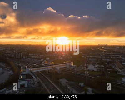 Sunset over Howth Junction & Donaghmede station Stock Photo - Alamy