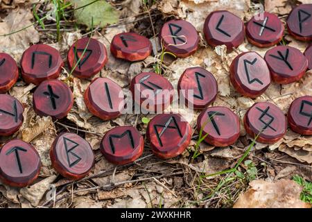 wooden runes on the ground Stock Photo - Alamy