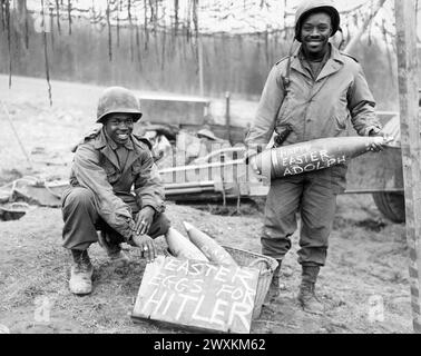 On Easter morning, T-5 William E. Thomas and Pfc. Joseph Jackson roll ...