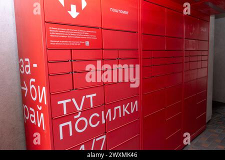 Receiving mail at the NOVA POSHTA parcel terminal. Contactless send and ...