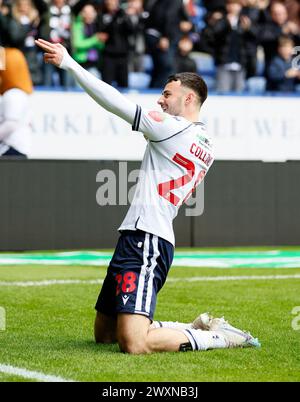 Bolton Wanderers' Aaron Collins celebrates scoring their side's second ...