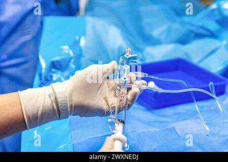 The procedure of inserting a double lumen catheter into a patient with ...