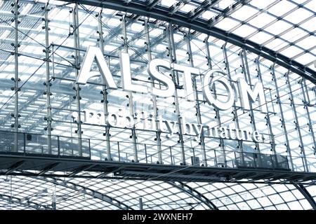 Alstom logo Company on arched metal vault at train station, French ...