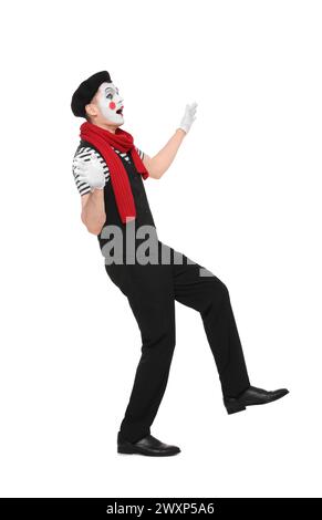 Funny mime artist making shocked face on white background Stock Photo ...