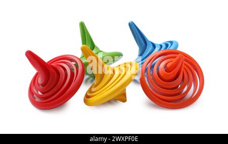 Many colorful spinning tops on light blue background, closeup Stock ...