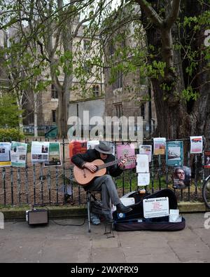 Busker in Cambridge UK Stock Photo - Alamy