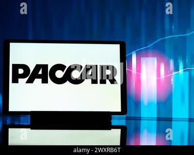 In this photo illustration, PACCAR Inc. logo seen displayed on a ...