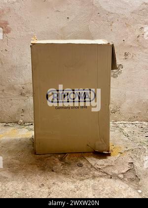 cardboard rimowa box with german language labels and distinctive design ...