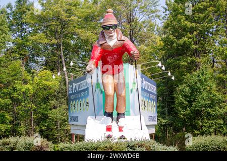Large Ski Bum Statue in Bessemer, Michigan Stock Photo - Alamy