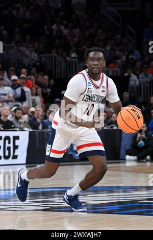 UConn guard Hassan Diarra (10) dribbles the ball as Providence guard ...