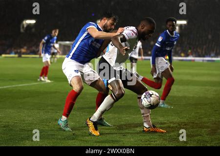 Portsmouth’s Joe Rafferty (right) during the Sky Bet League One match ...
